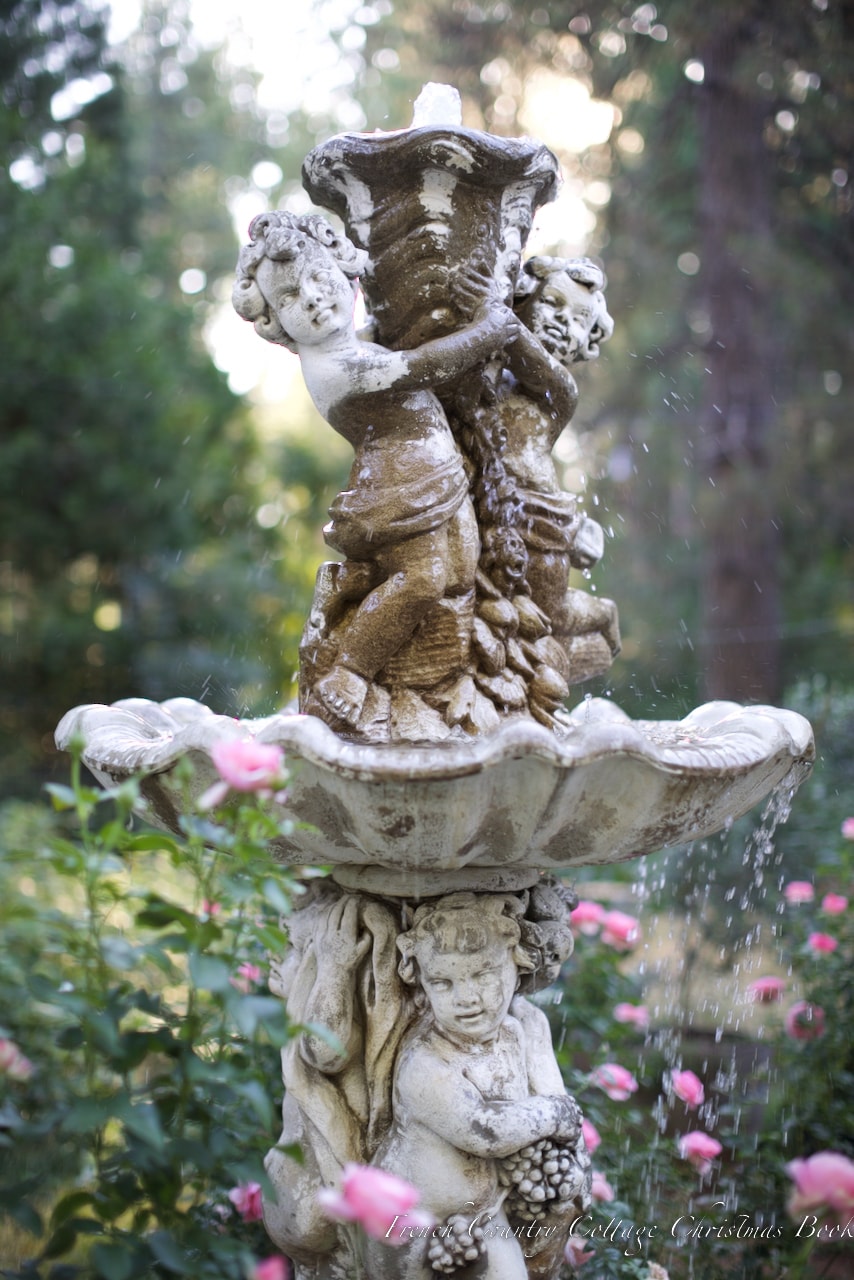 Where the Beautiful Antique Cherub Statue landed - French Country Cottage